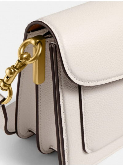 Coach - купить оригинальные аксессуары бренда в Москве